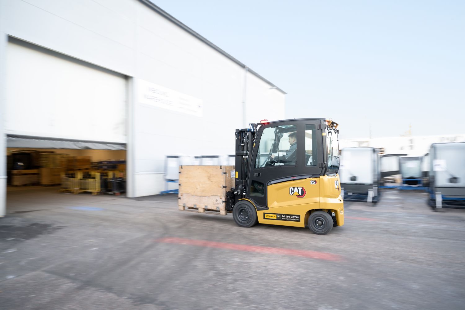 Impact Handling celebrates 15 years with Cat Lift Trucks - UK Manufacturing